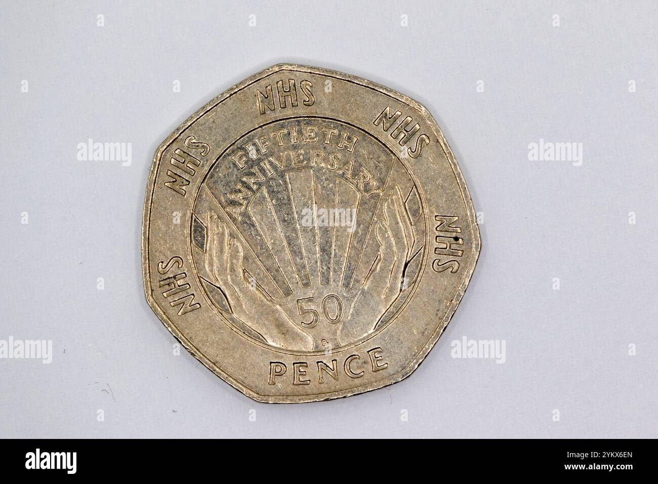 A fifty pence coin commemorating the NHS's fiftieth anniversary. The ...