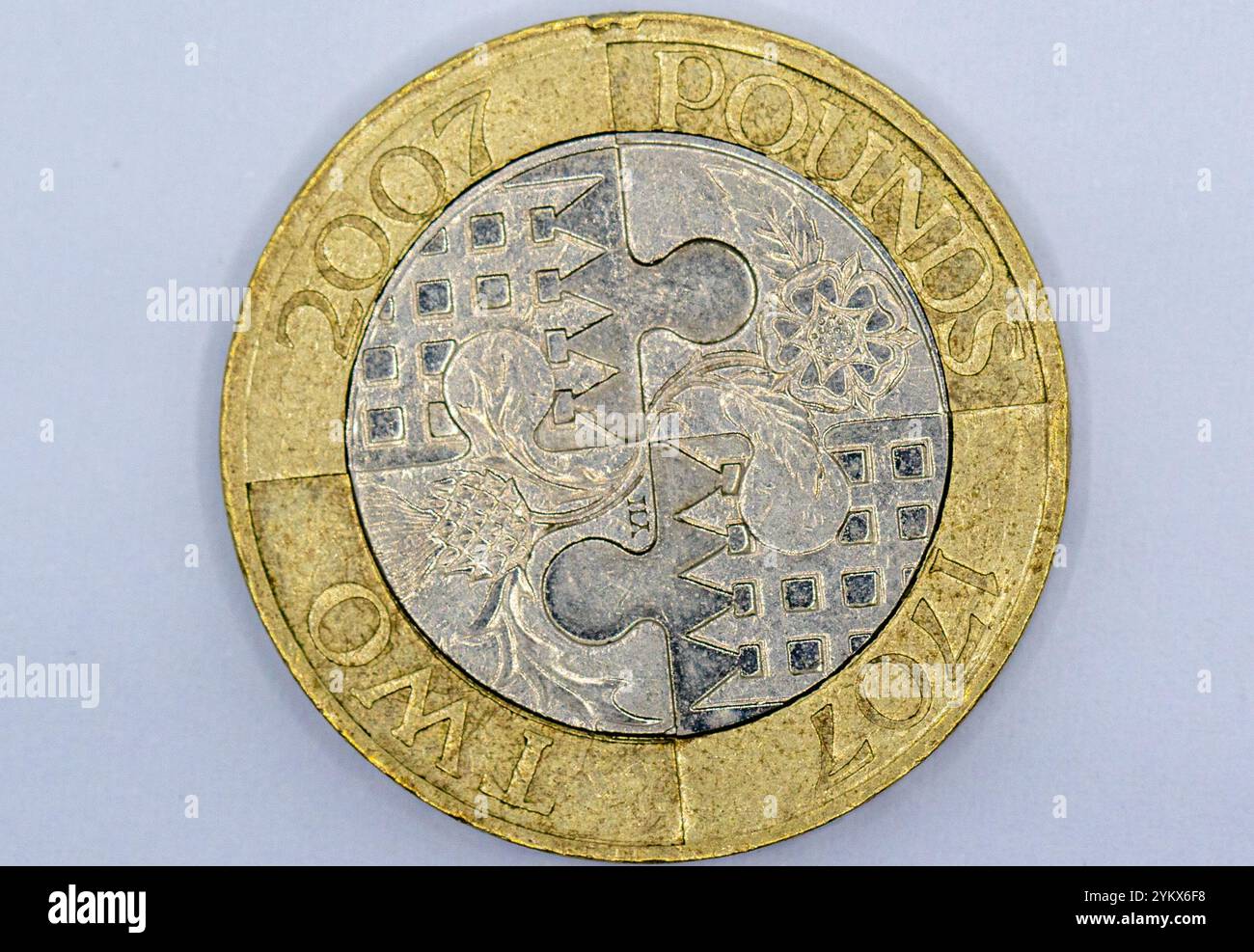 Close-up view of a 2007 two-pound British coin. The coin features a ...
