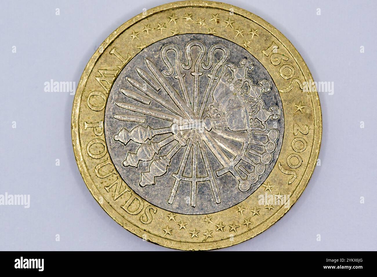 Close-up of a two pound (£2) British coin from 2002. The coin features ...