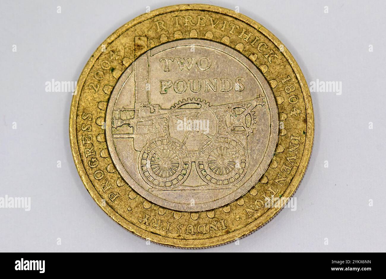 A close-up shot of a British two-pound coin from 2004, featuring a ...