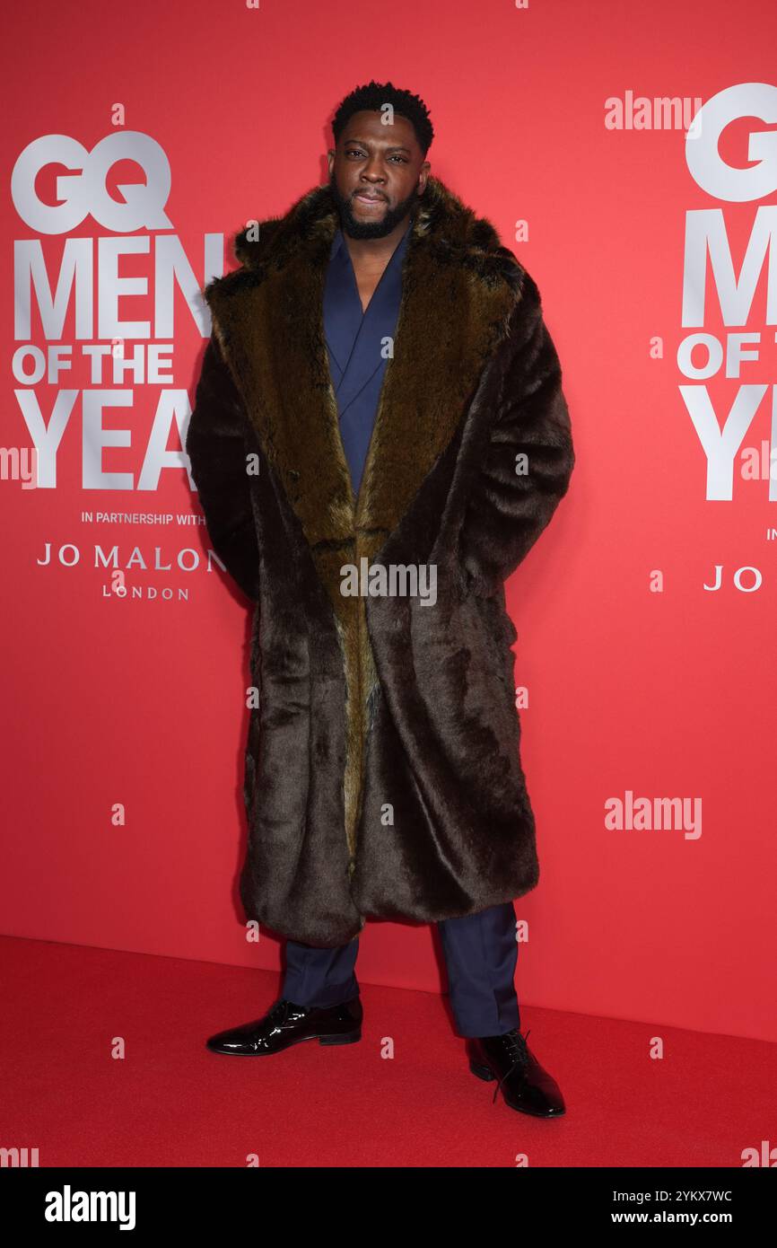 Rapman attends the GQ Men of the Year photocall at Kensington Roof ...