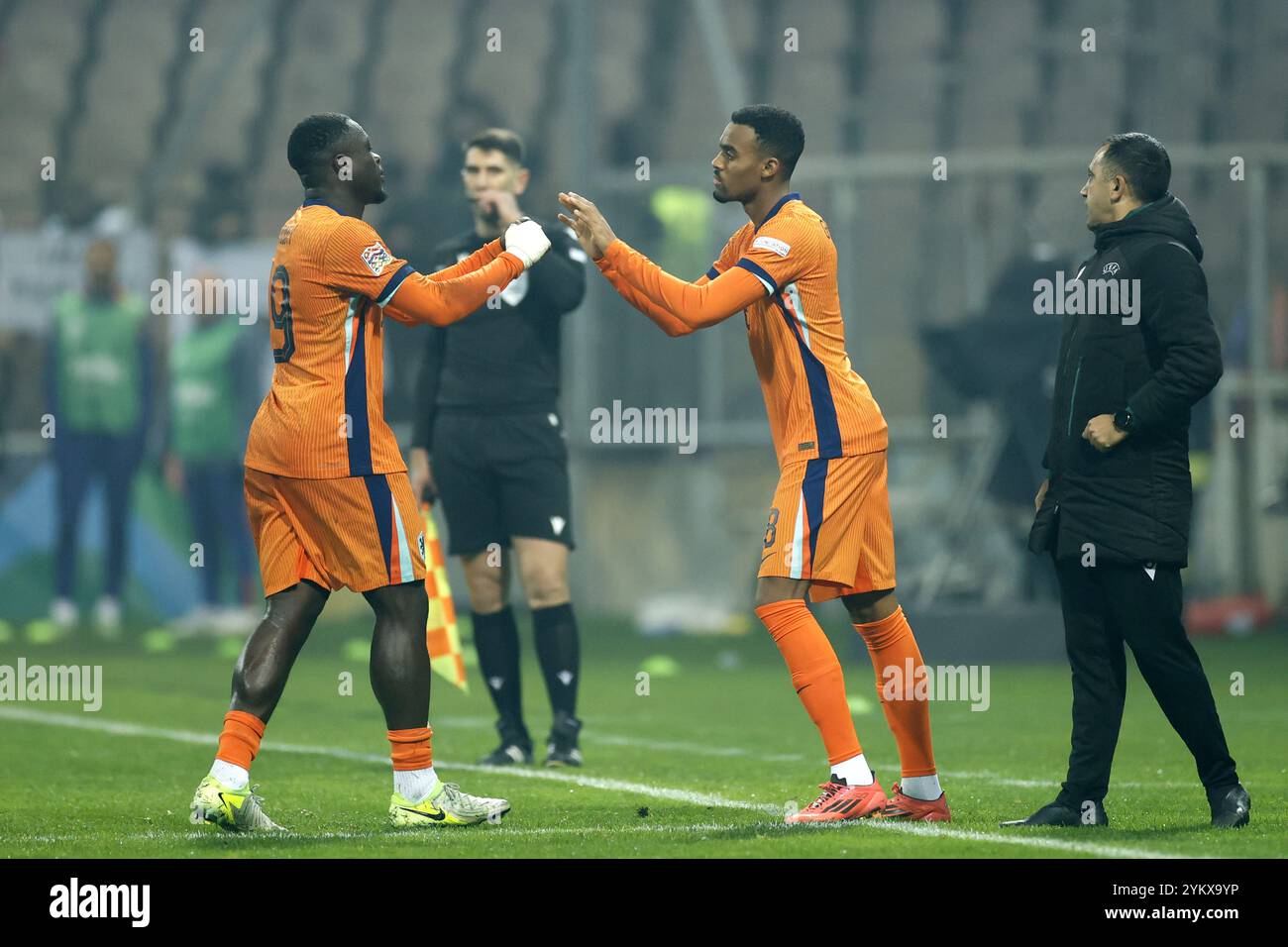 ZENICA - (l-r) Wout Weghorst of Holland, Ryan Gravenberch of Holland ...