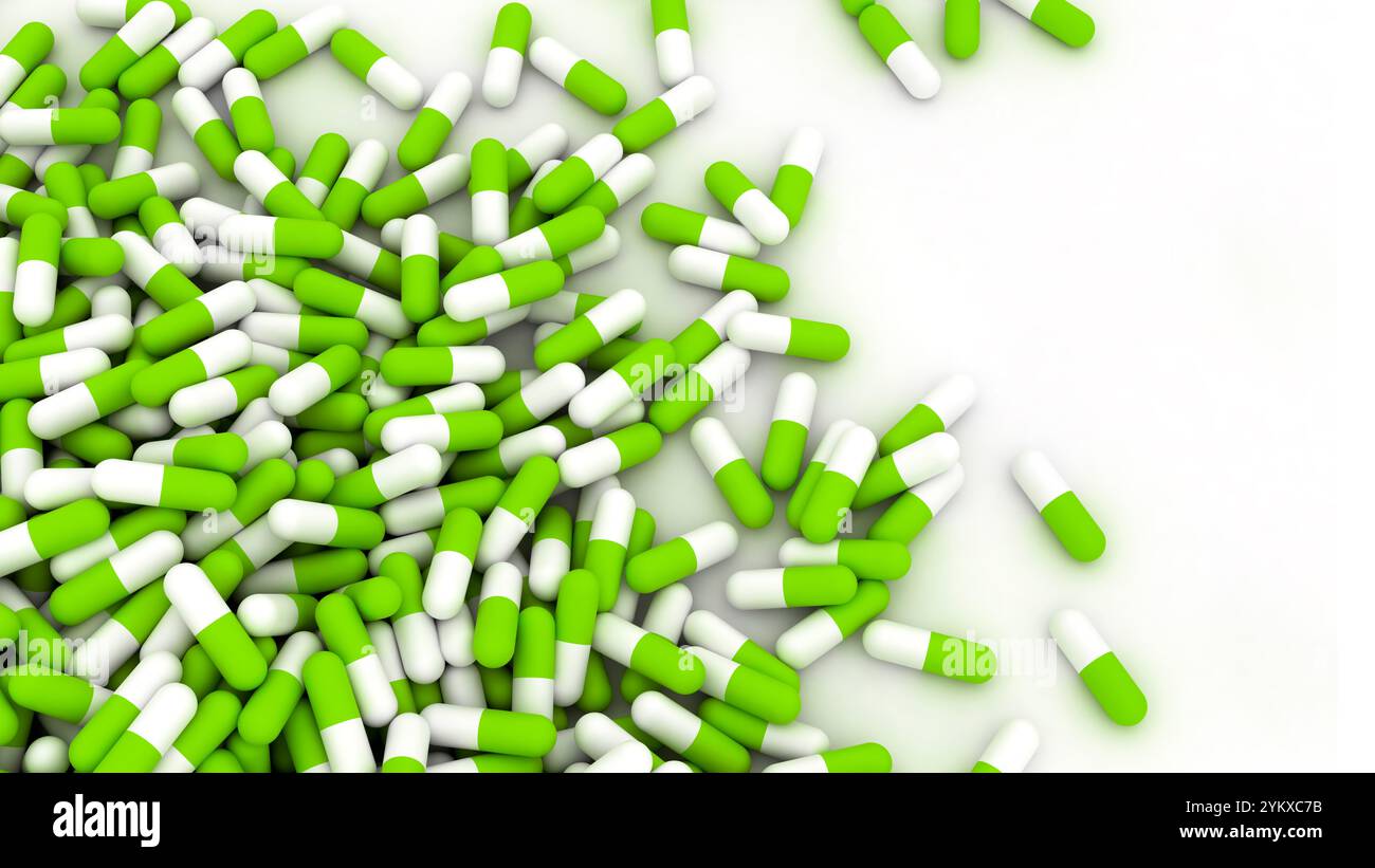 Green supplement herbal pills on white background Stock Photo - Alamy