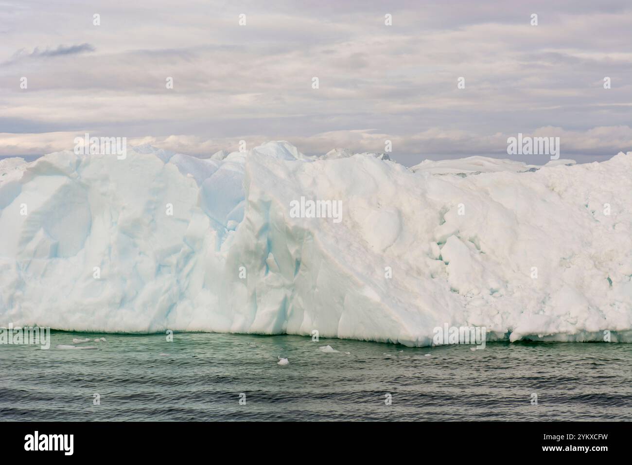 A striking close-up of an iceberg near Ilulissat, Greenland, showcasing ...