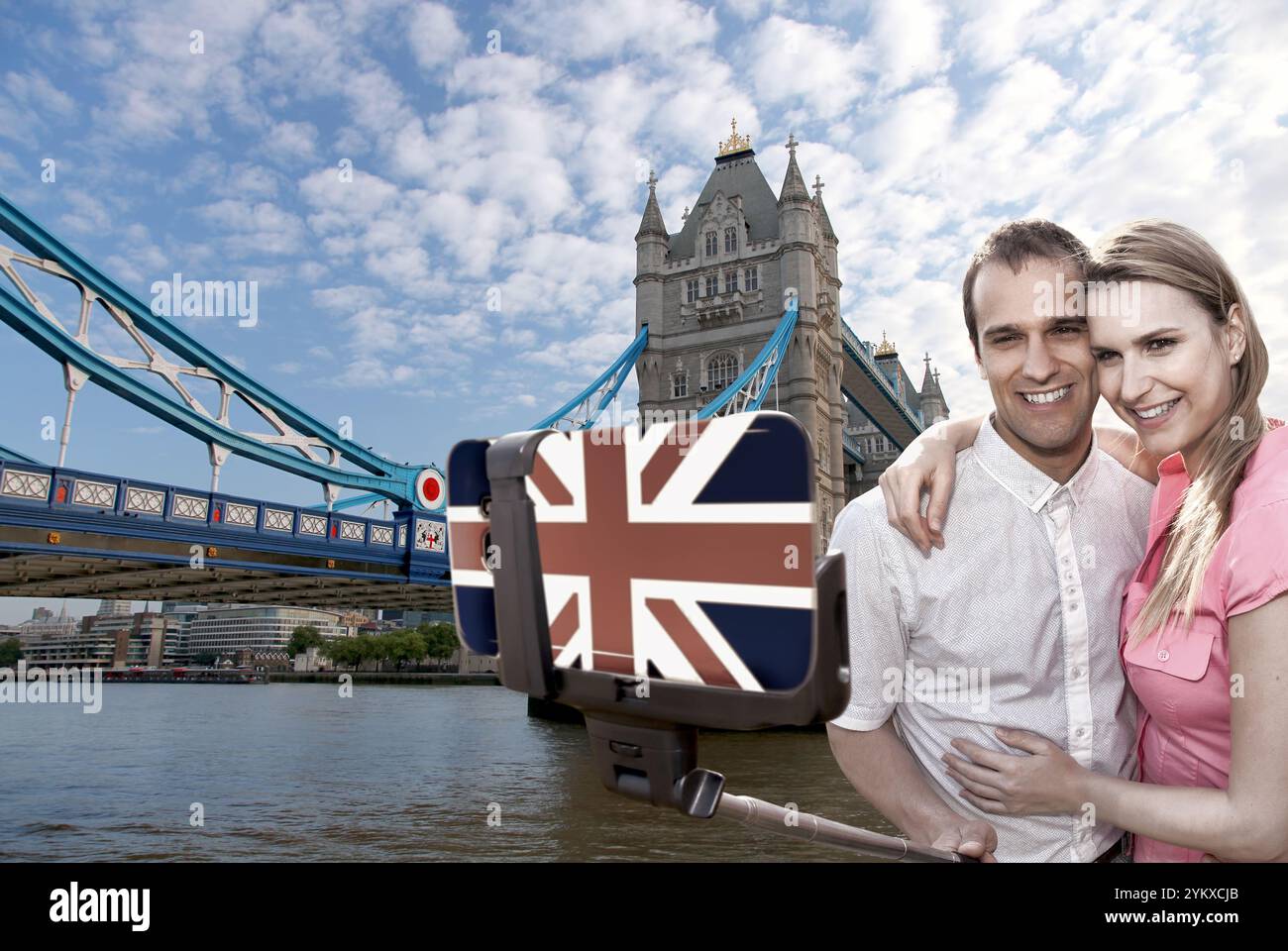 Couple in love taking a selfie portrait in front of Tower Bridge on ...