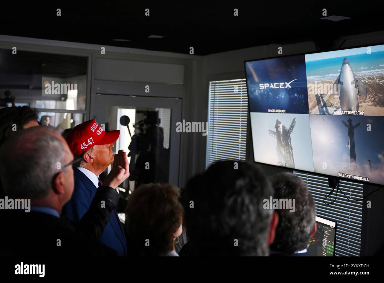 President-elect Donald Trump listens as Elon Musk explains the ...