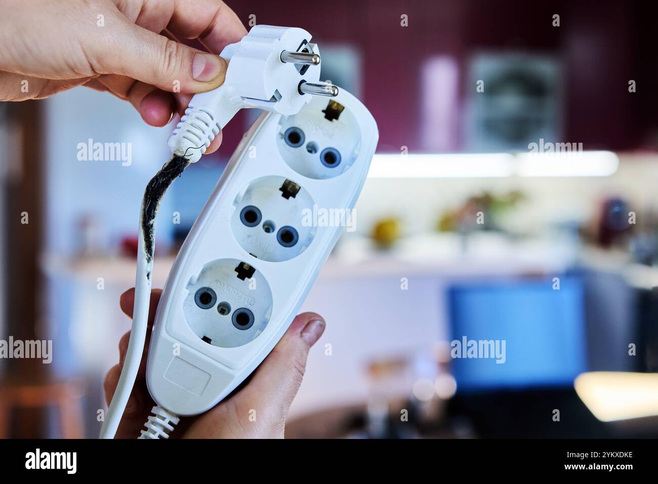 Extension cord damage is caused short circuits after overloading, burnt ...