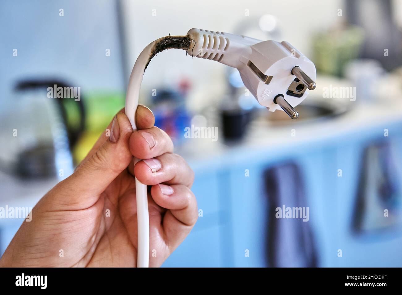 Extension cord melted and charred due to overload and could cause fire ...