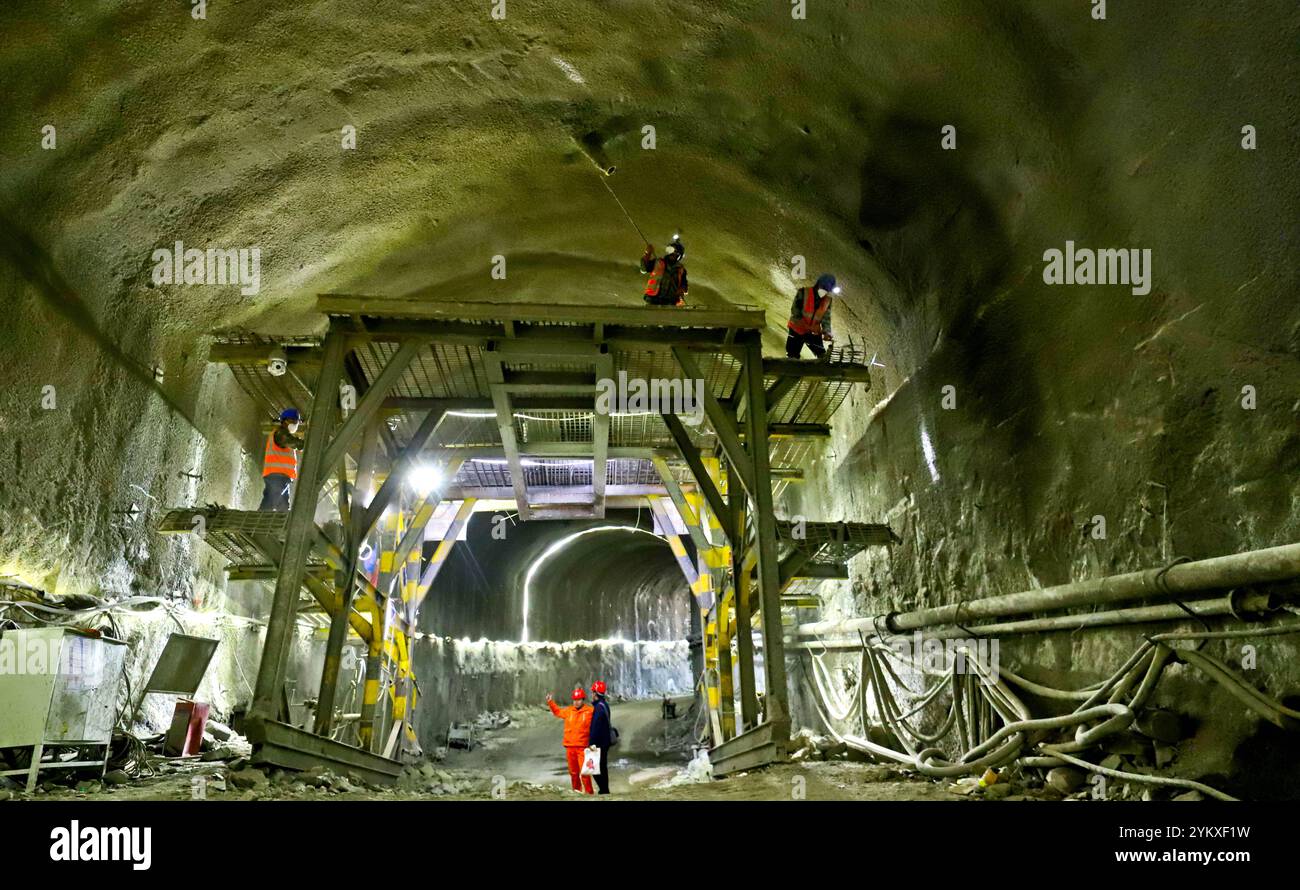 ZHANGYE, CHINA - NOVEMBER 19, 2024 - Builders carry out a safety test ...