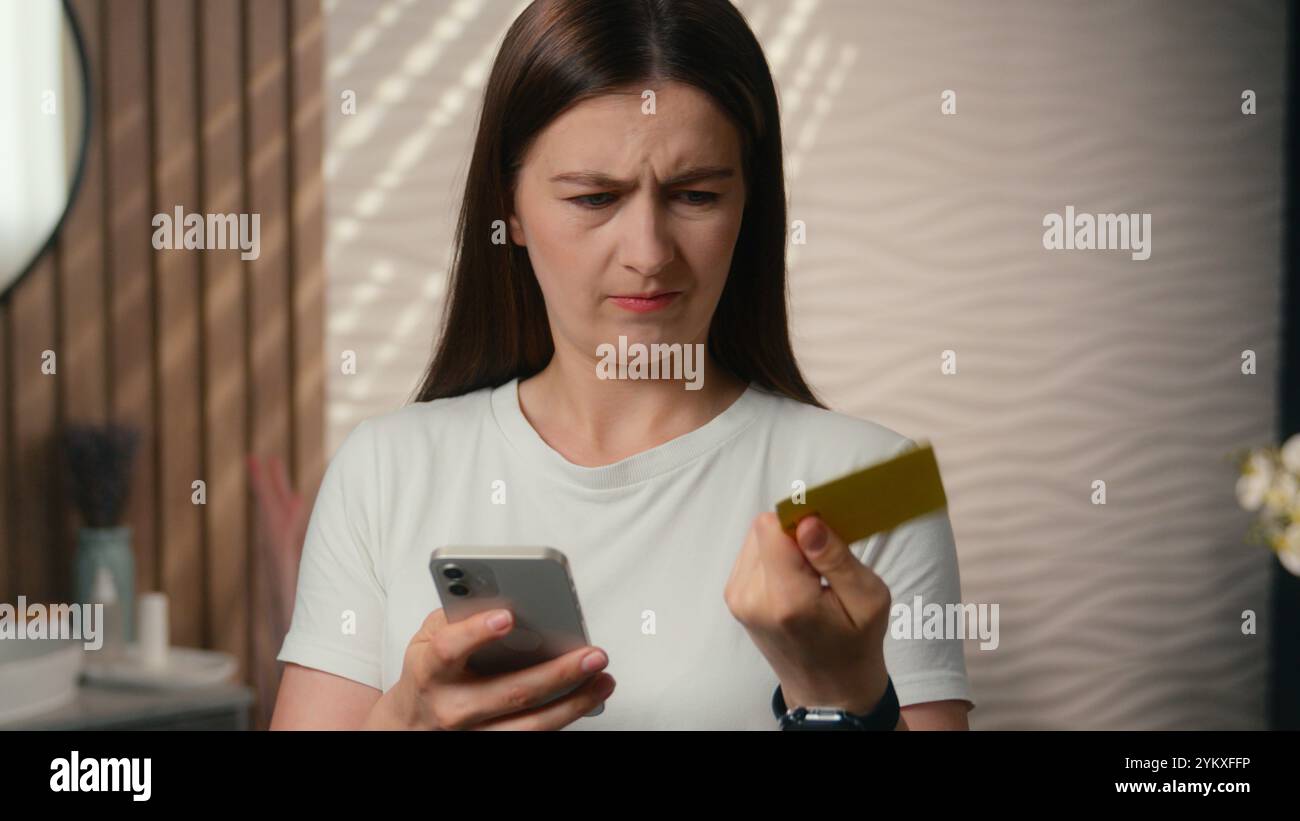 Stressed Caucasian woman lady confused girl anxious displeased female customer shopping online ...
