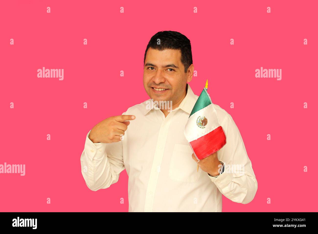 40 year old dark Mexican man shows the flag of Mexico with pride to ...