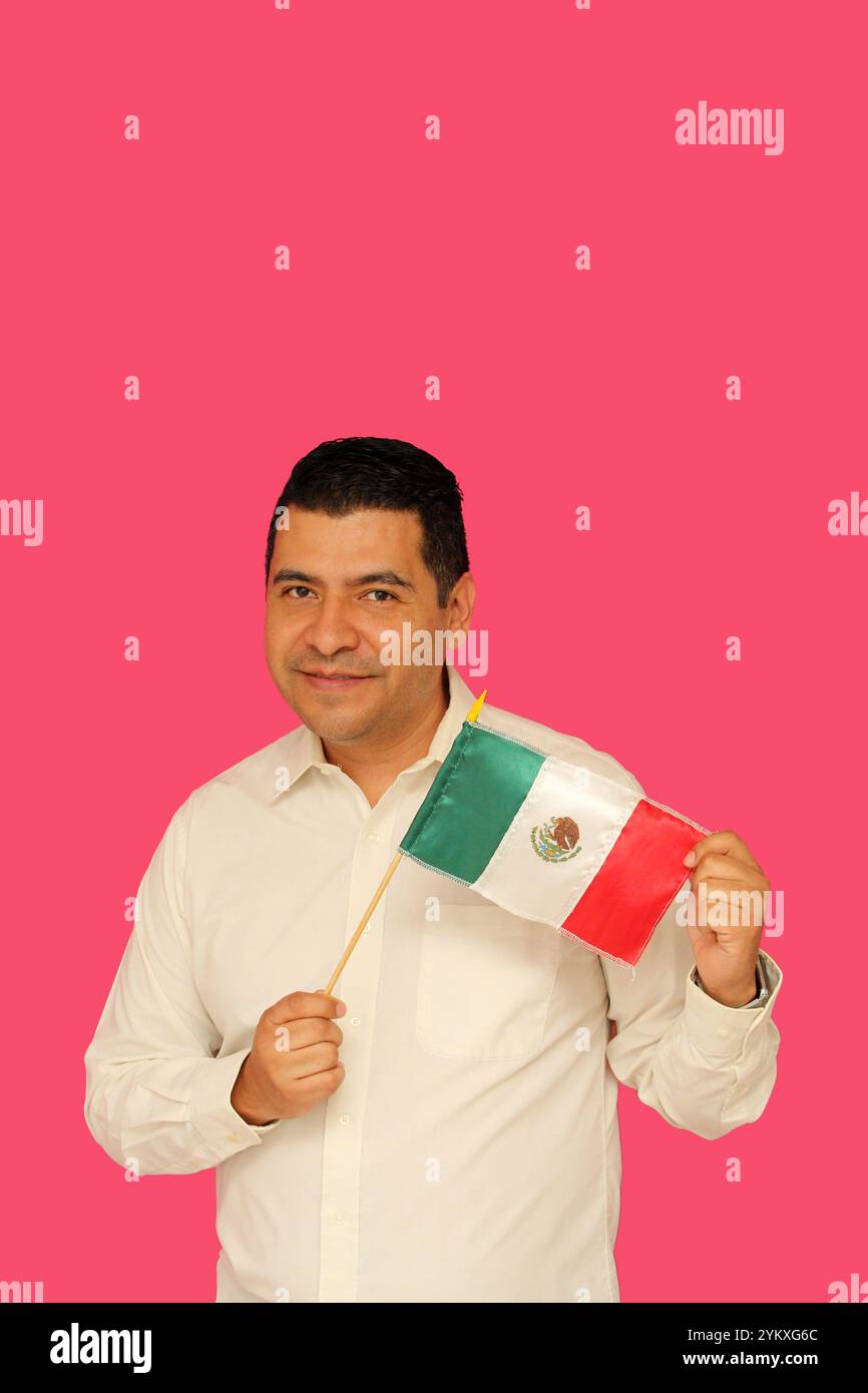 40 year old dark Mexican man shows the flag of Mexico with pride to ...