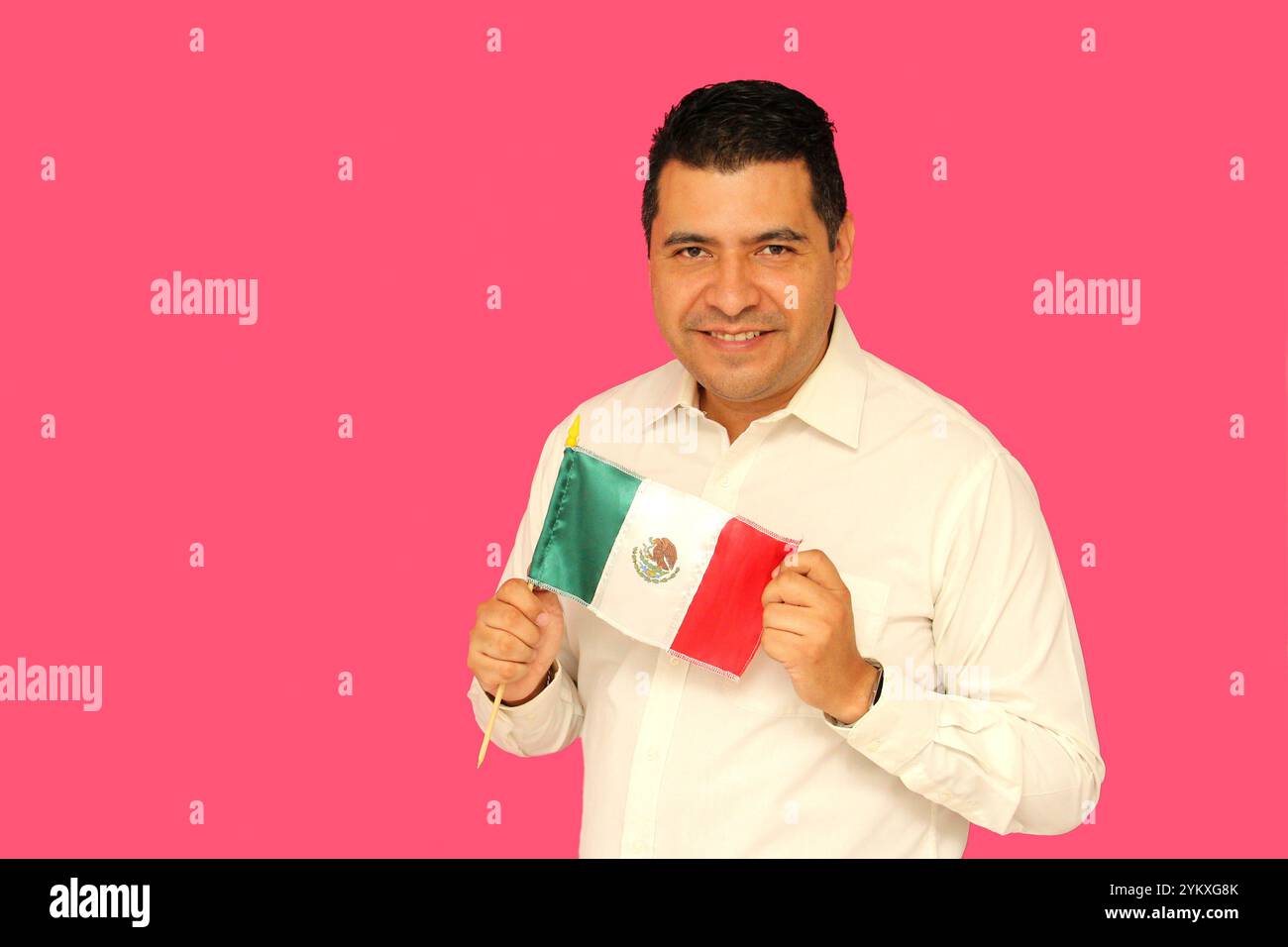 40 year old dark Mexican man shows the flag of Mexico with pride to ...