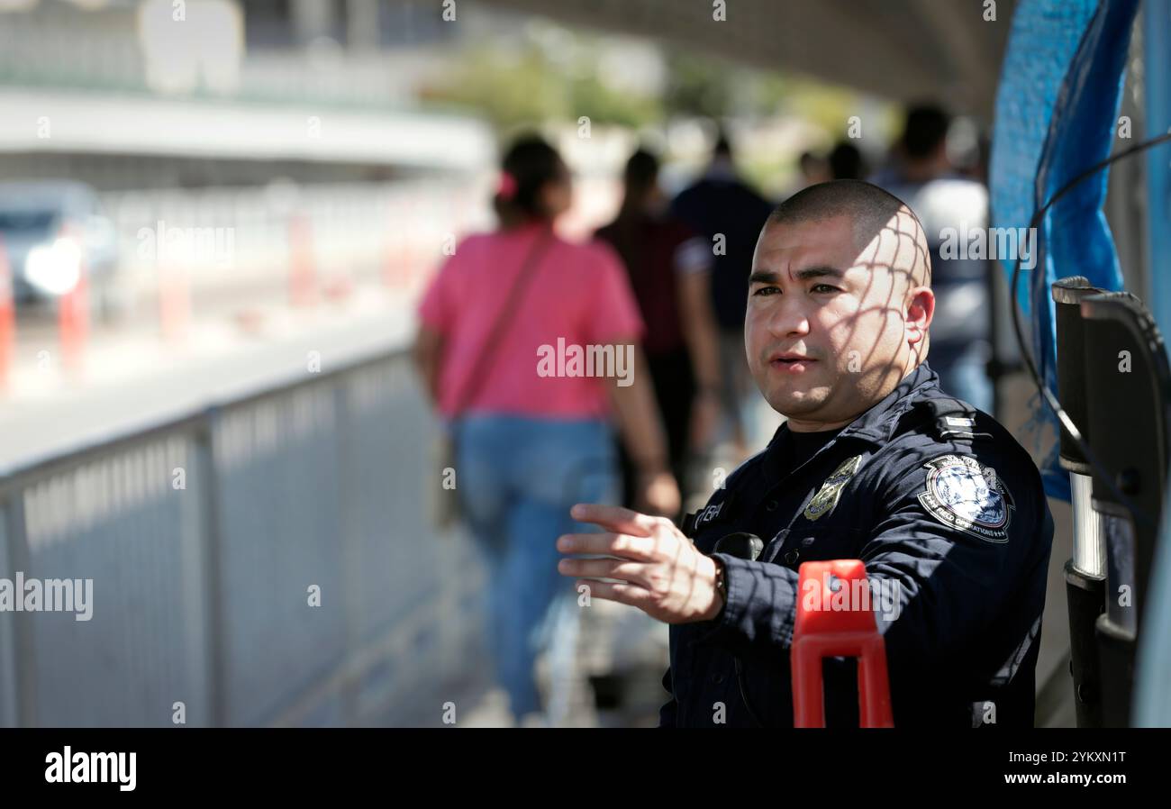 U.S. Customs and Border Protection officers screen border crossers as ...