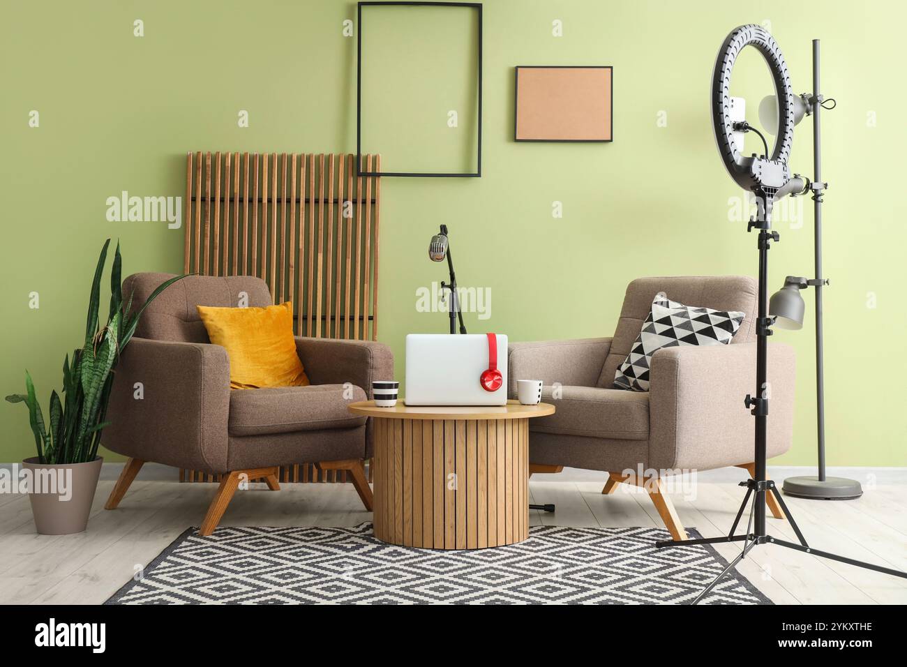 Interior of podcaster's studio with armchairs and table Stock Photo - Alamy