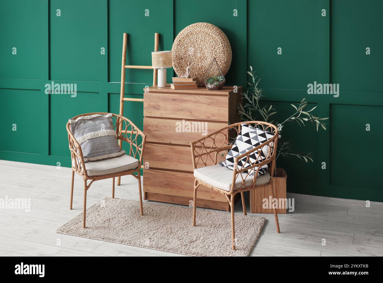 Interior of living room with wooden commode, armchairs and ladder Stock ...