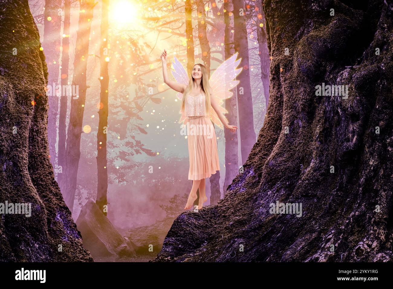 Enchanting fairy touching magic light among trees. Mesmerizing girl ...