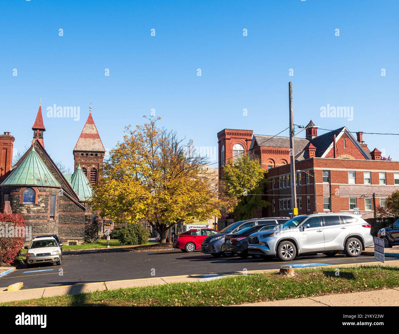 Churches and a brick building in the downtown area of Oil City ...