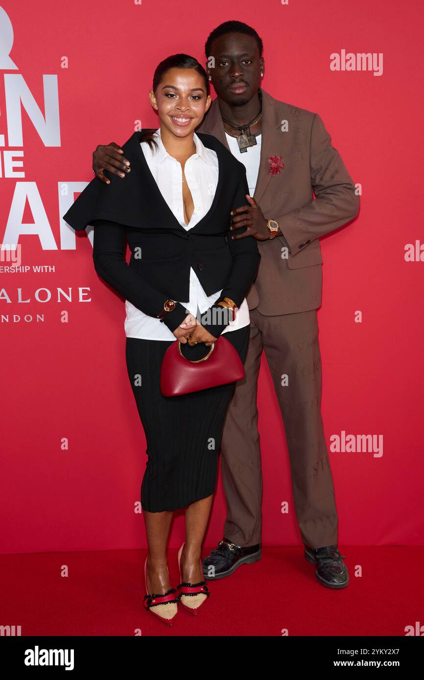 Tallulah, left, and Slawn pose for photographers upon arrival at the GQ ...