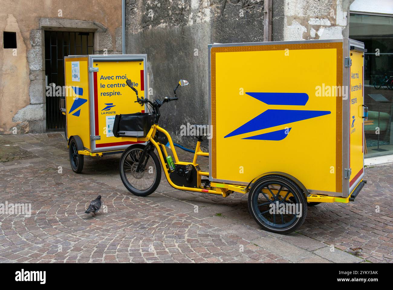 French yellow La Poste delivery Service bicycles with trailers seen in ...