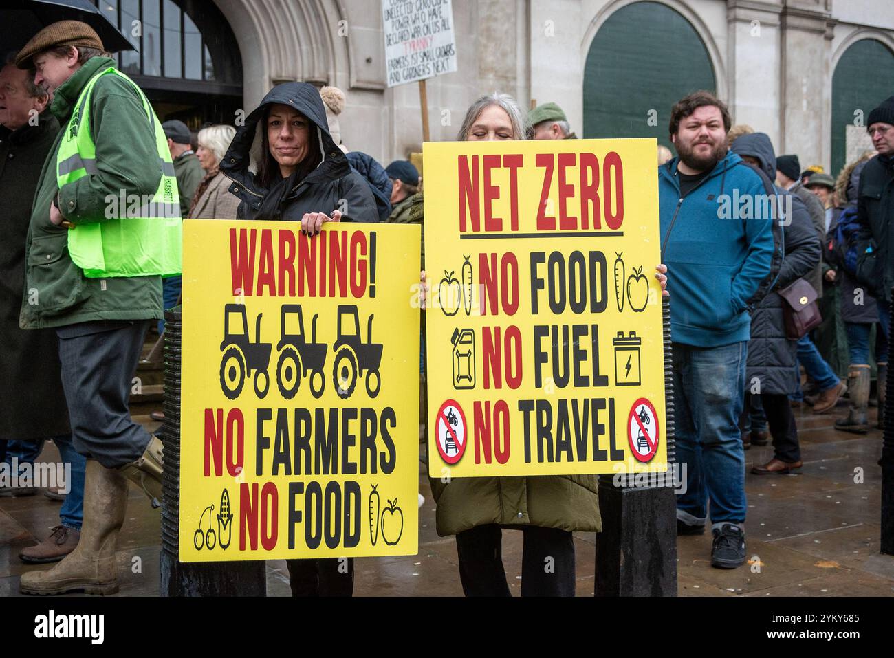 London, UK. 19th Nov, 2024. Protesters hold placards by the Parliament ...