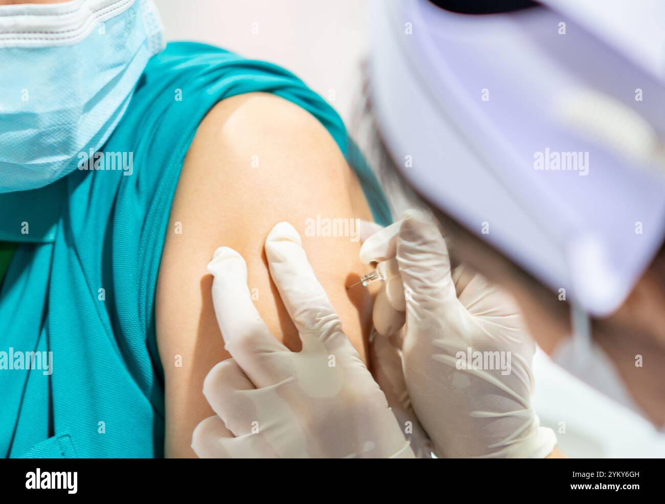 Nurse vaccine injection details on shoulder patient in hospital Stock ...