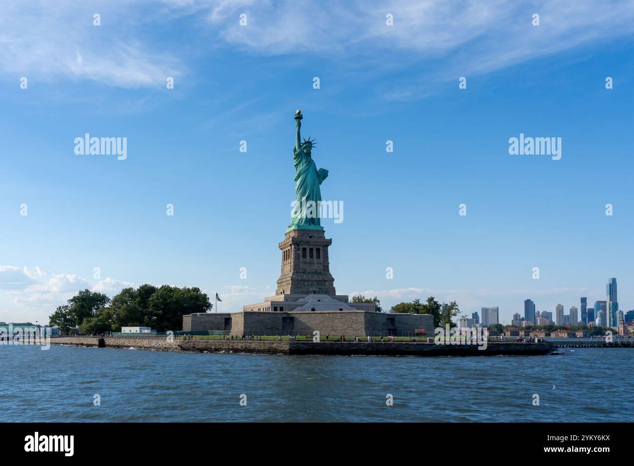 Liberty Island and Statue of Liberty view from the water. New York City ...
