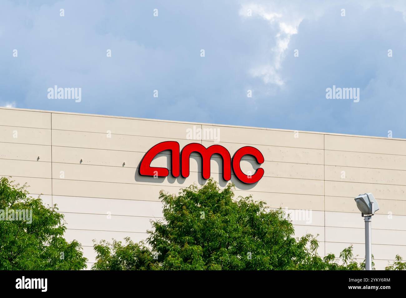 An AMC logo sign on the building at one of their locations in New ...