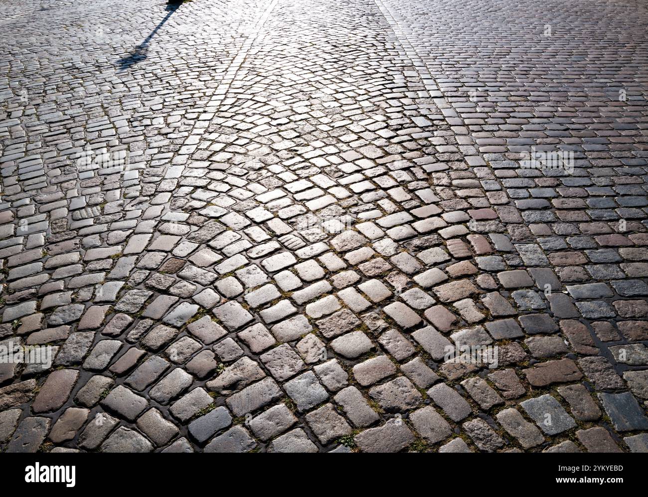 Pavement road. Background of bricks road. Stone cladding pavement ...