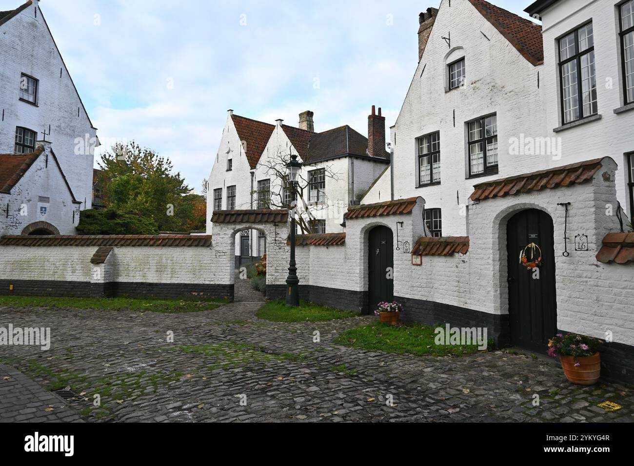 White buildings in The Princely Beguinage Ten Wijngaerde convent ...