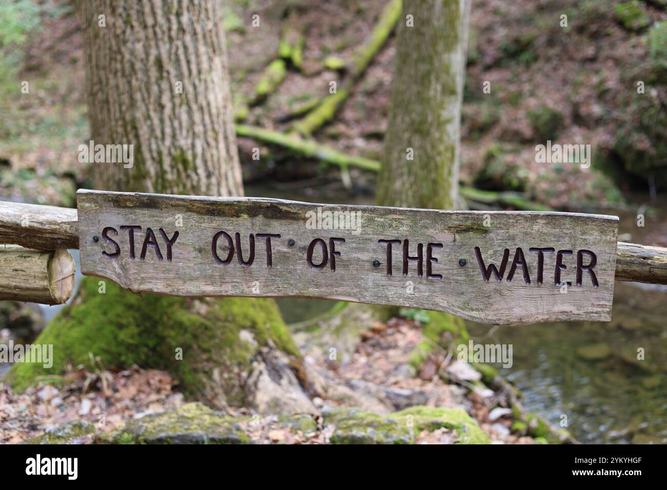 Stay out of the water wooden sign in nature park area Stock Photo - Alamy