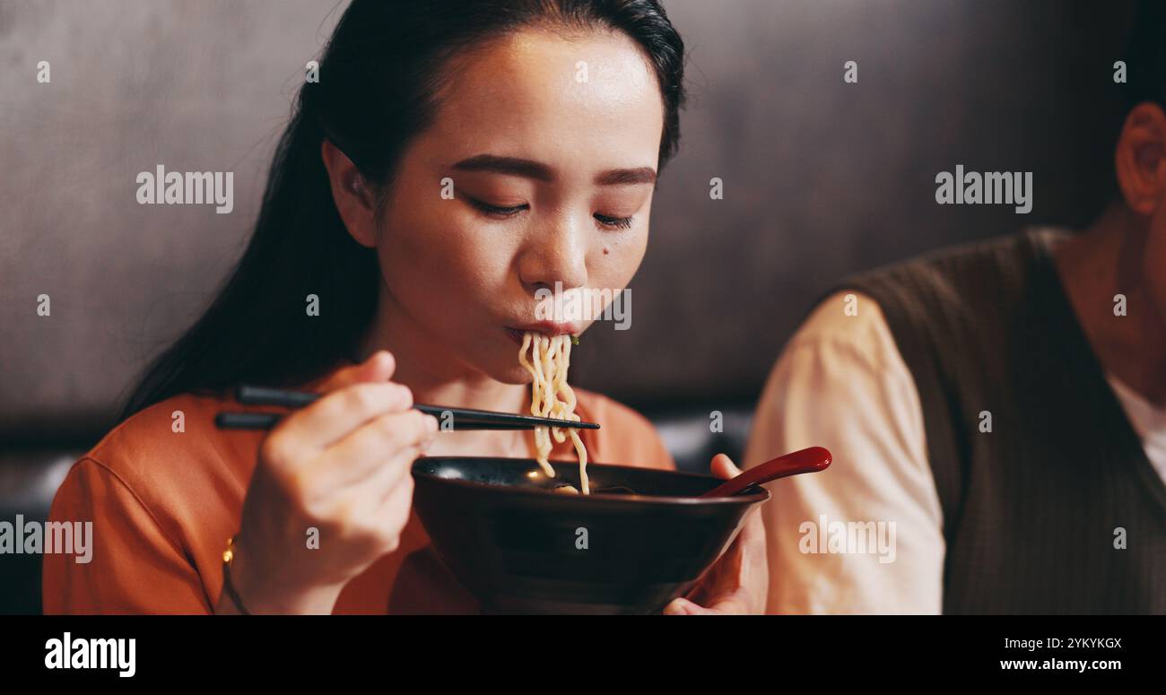 Japanese woman, eating lunch and man in restaurant for date, bonding ...