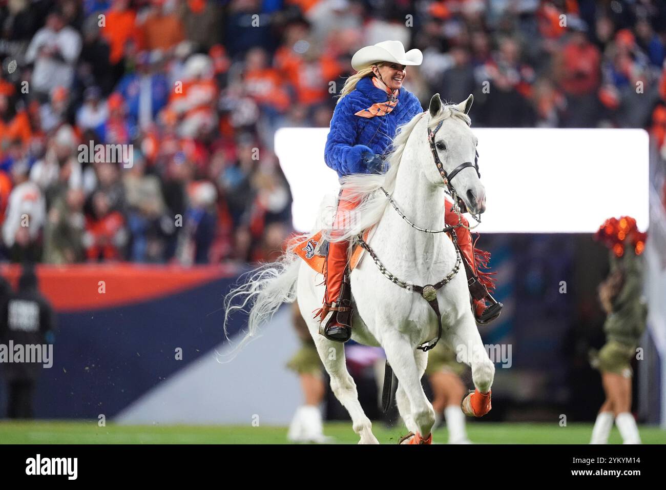 Denver Broncos mascot Thunder is riden by Anne Judge in the second half ...