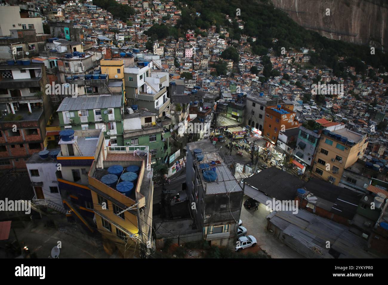 The houses of the Rocinha favela in Rio de Janeiro, Brazil, stretch ...