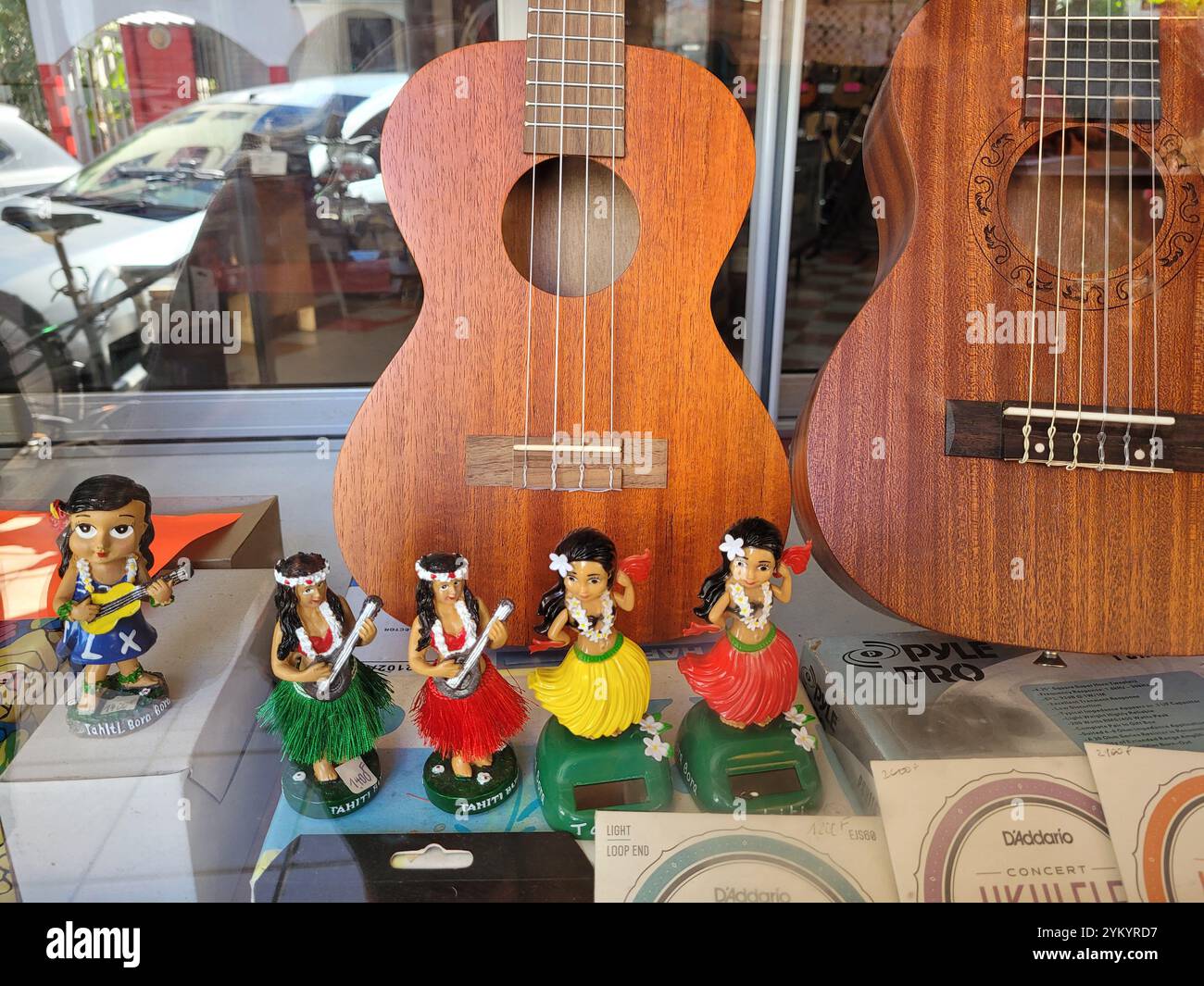 Souvenirs displayed in a window shop of Papeete, French Polynesia Stock ...