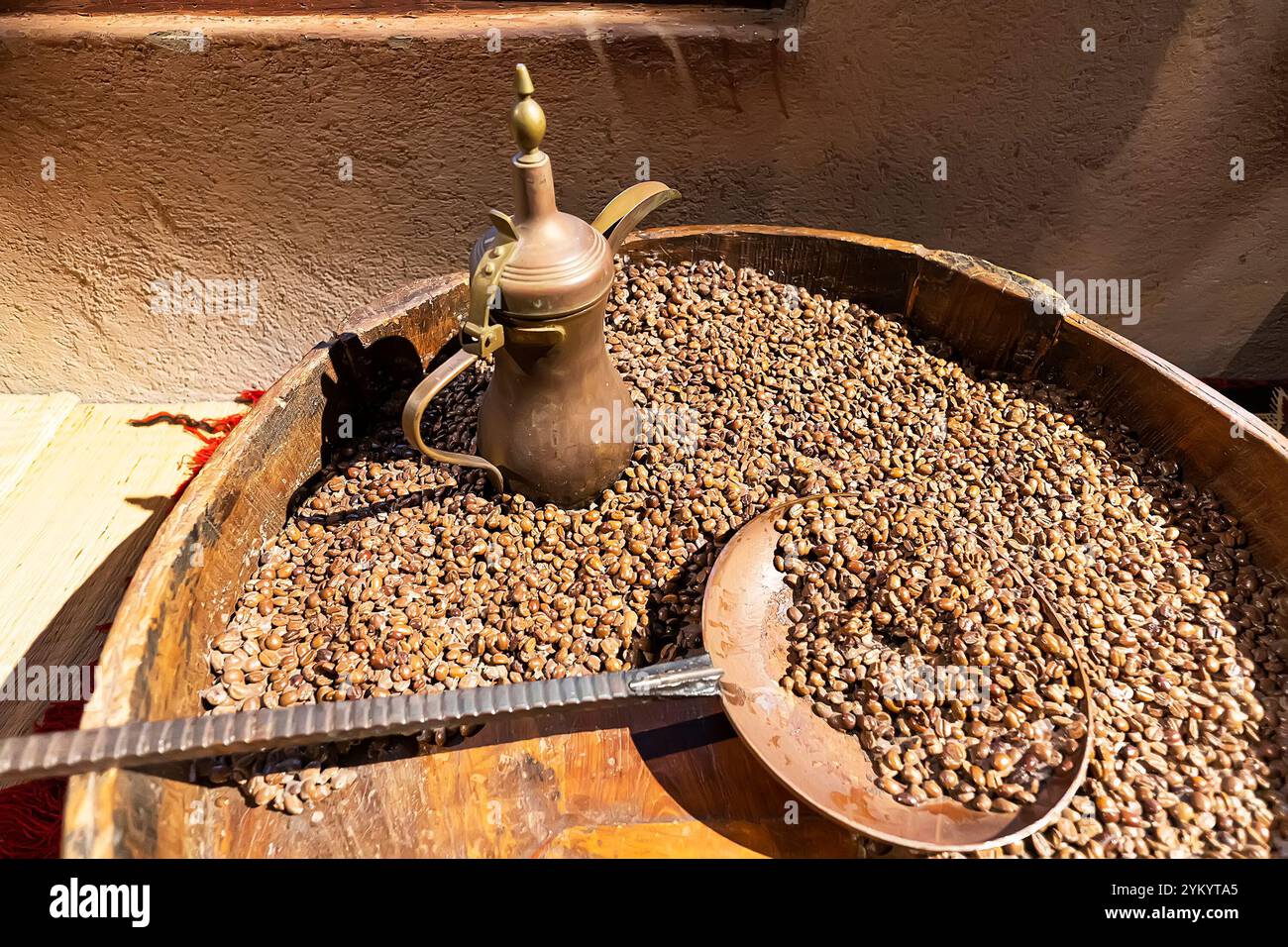 coffeepot with coffee beans. Drinking coffee in the Arabic style ...