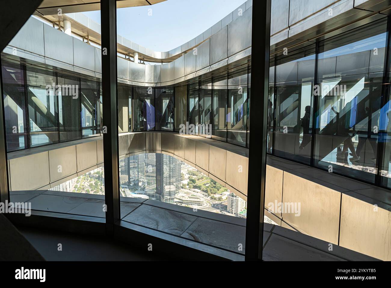 Dubai, UAE View inside the Sky View skyscraper. Tourists walk on the ...