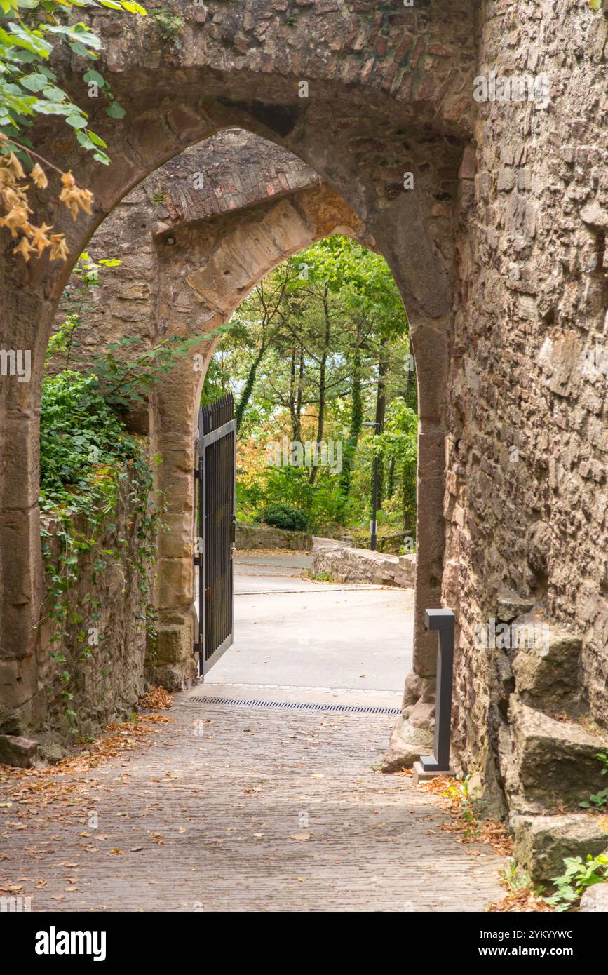 The stone arch entrance leads to the ruins of the old medieval castle ...
