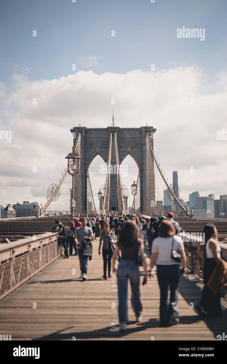 The Brooklyn Bridge connects Manhattan and Brooklyn, featuring a ...