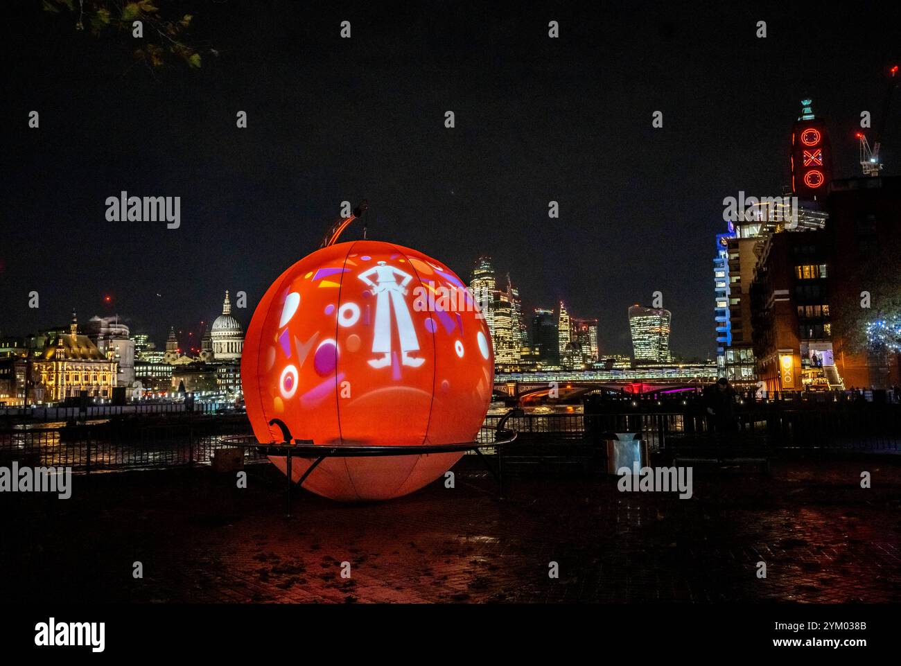 EDITORIAL USE ONLY A 4M diameter replica of a Christmas 'snow globe' is ...