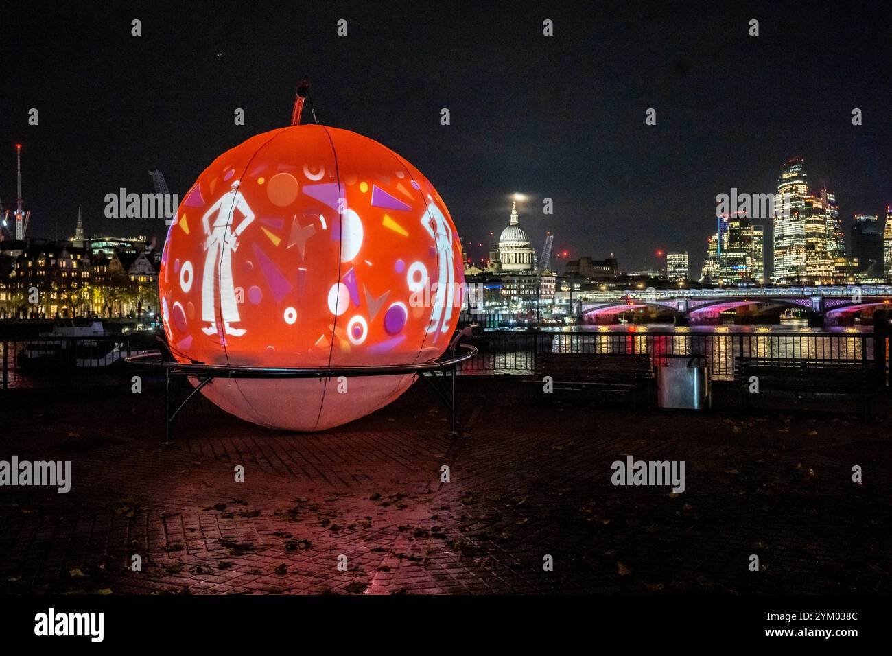 EDITORIAL USE ONLY A 4M diameter replica of a Christmas 'snow globe' is ...