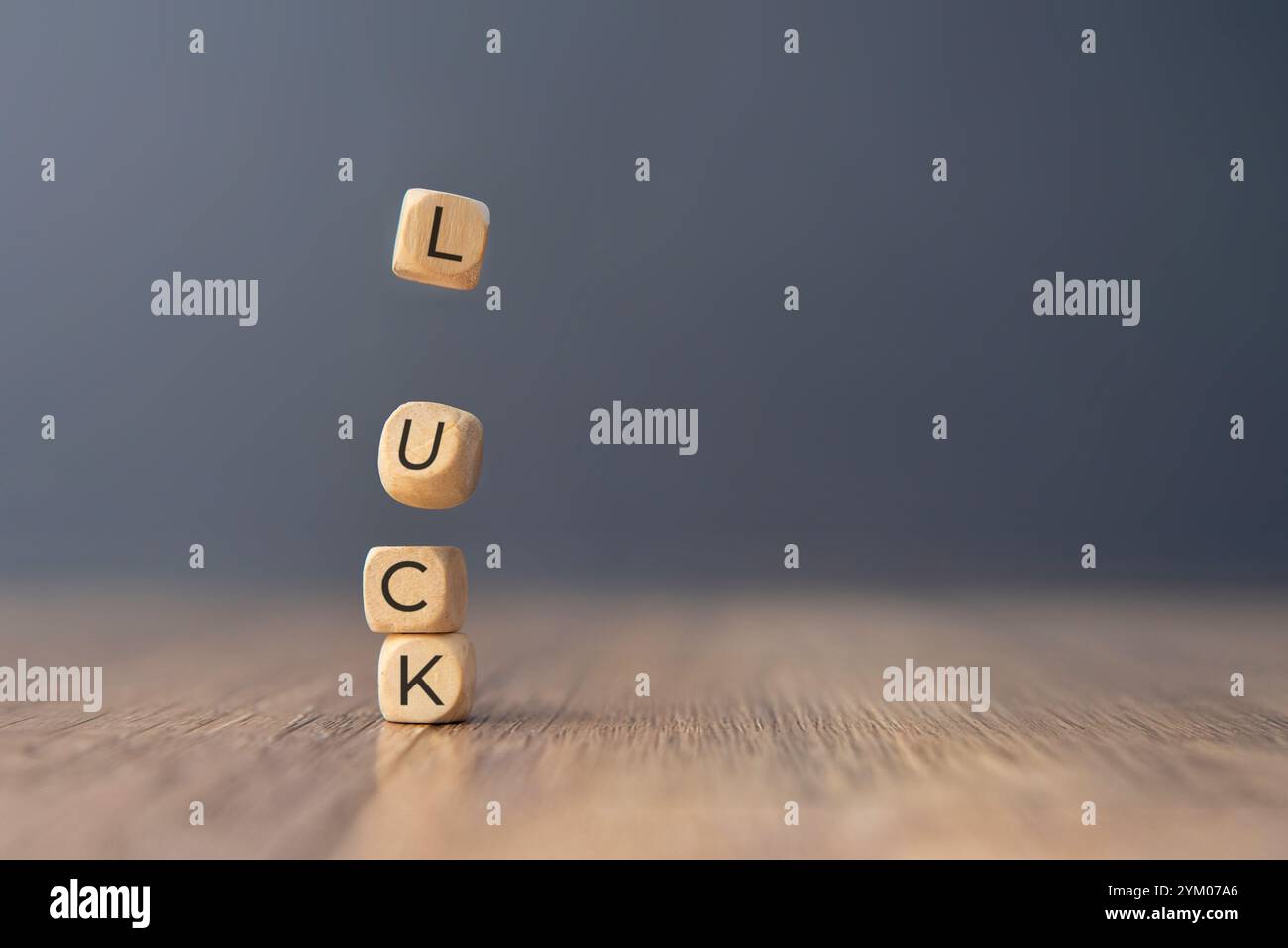 One block with the letter "L" is falling down towards the others. Copy ...