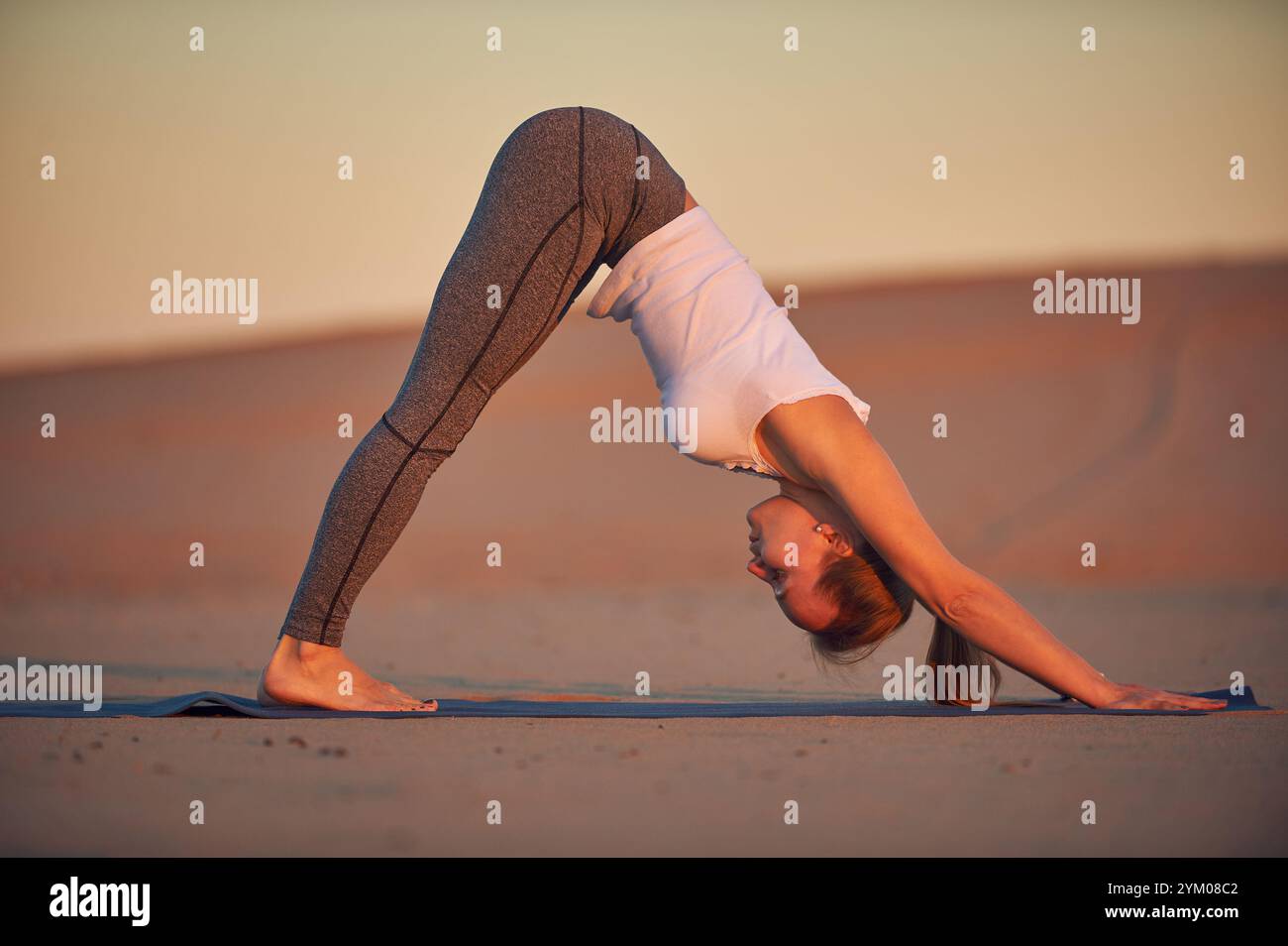 Yoga downward dog desert hi-res stock photography and images - Alamy