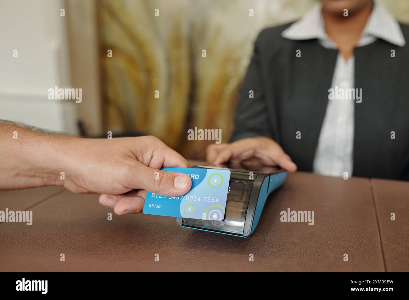 Man Completing Payment Using Card Reader Device Stock Photo - Alamy