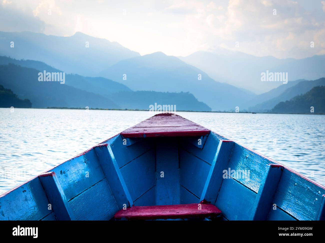Ship nose front view on water and himalayas mountain range, Pokhara ...