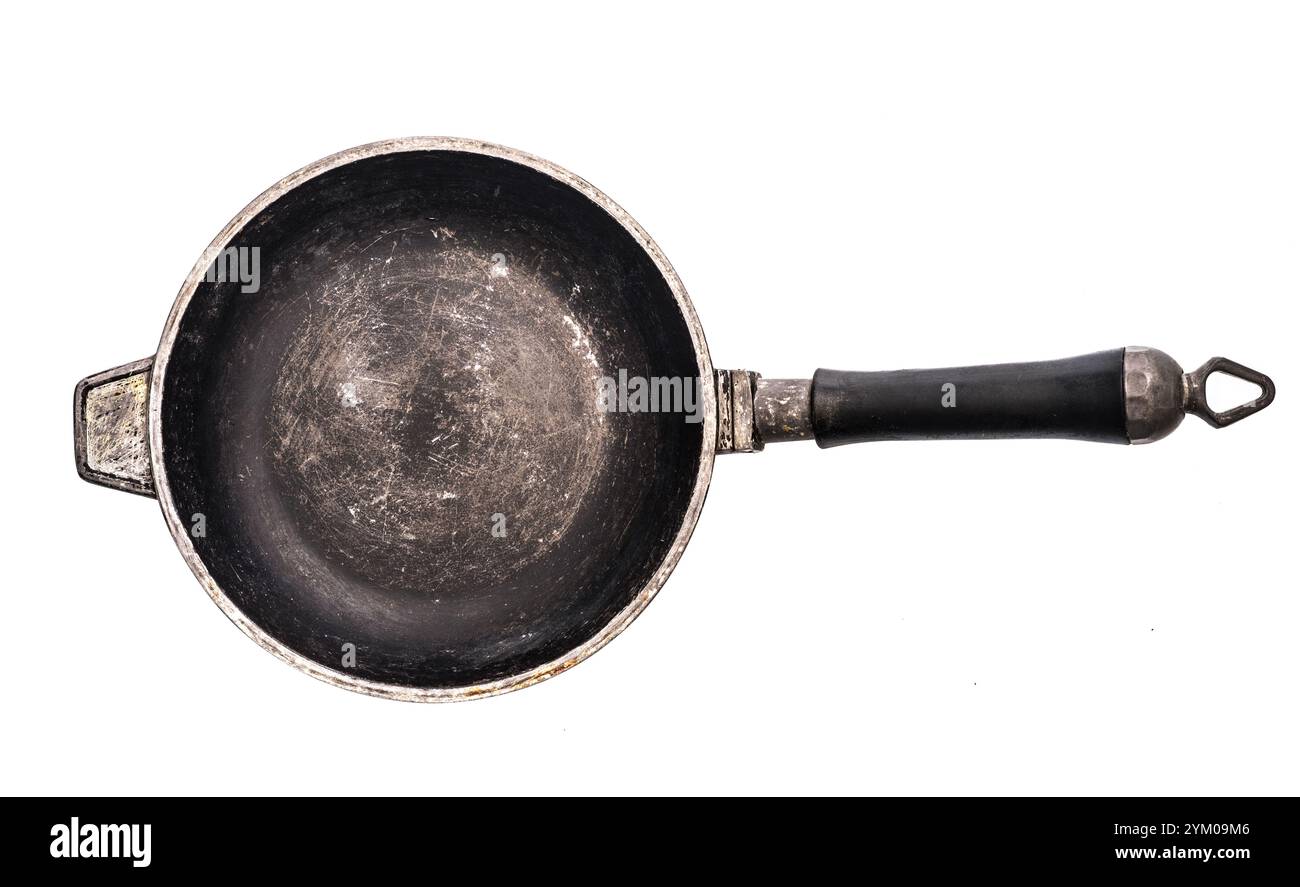 Old empty cast iron frying pan isolated on white background Stock Photo ...