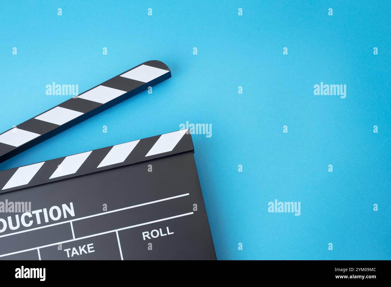 cinema clap on blue background Stock Photo - Alamy