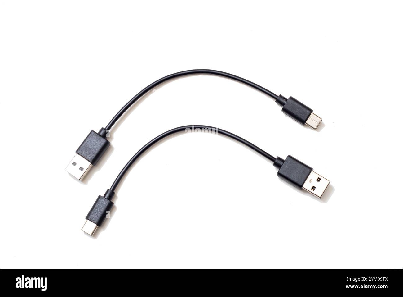On a clean white background, two USB cables are connected to each other ...