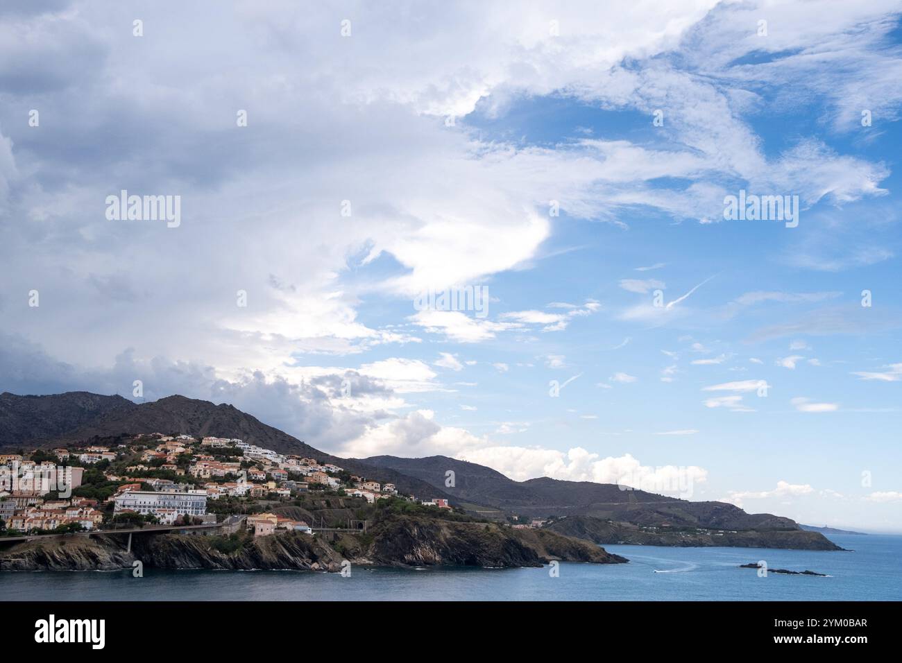 The seaside resort and the Pyrenees mountains seen from Cap Cerbere on ...