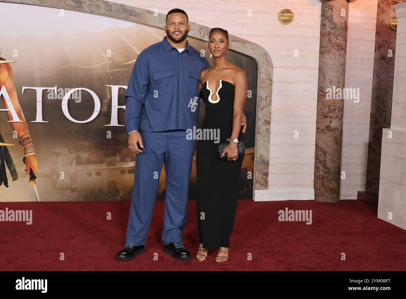 November 18, 2024, Los Angeles, California, USA: Aaron Donald, Erica ...
